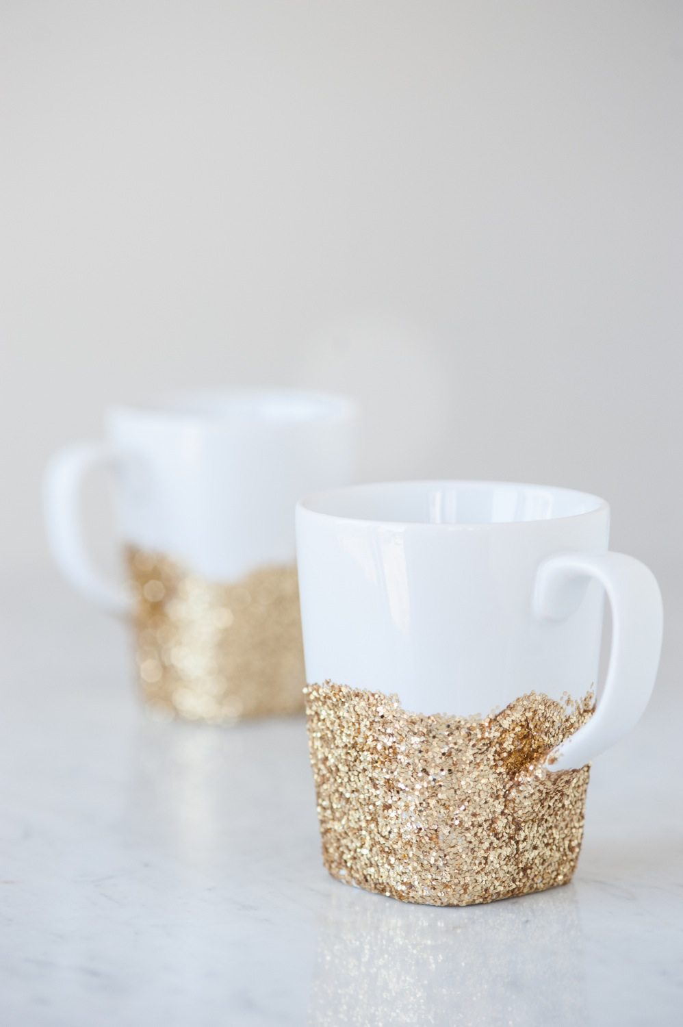 DIY Gold Glitter Dipped Mugs - The Sweetest Occasion